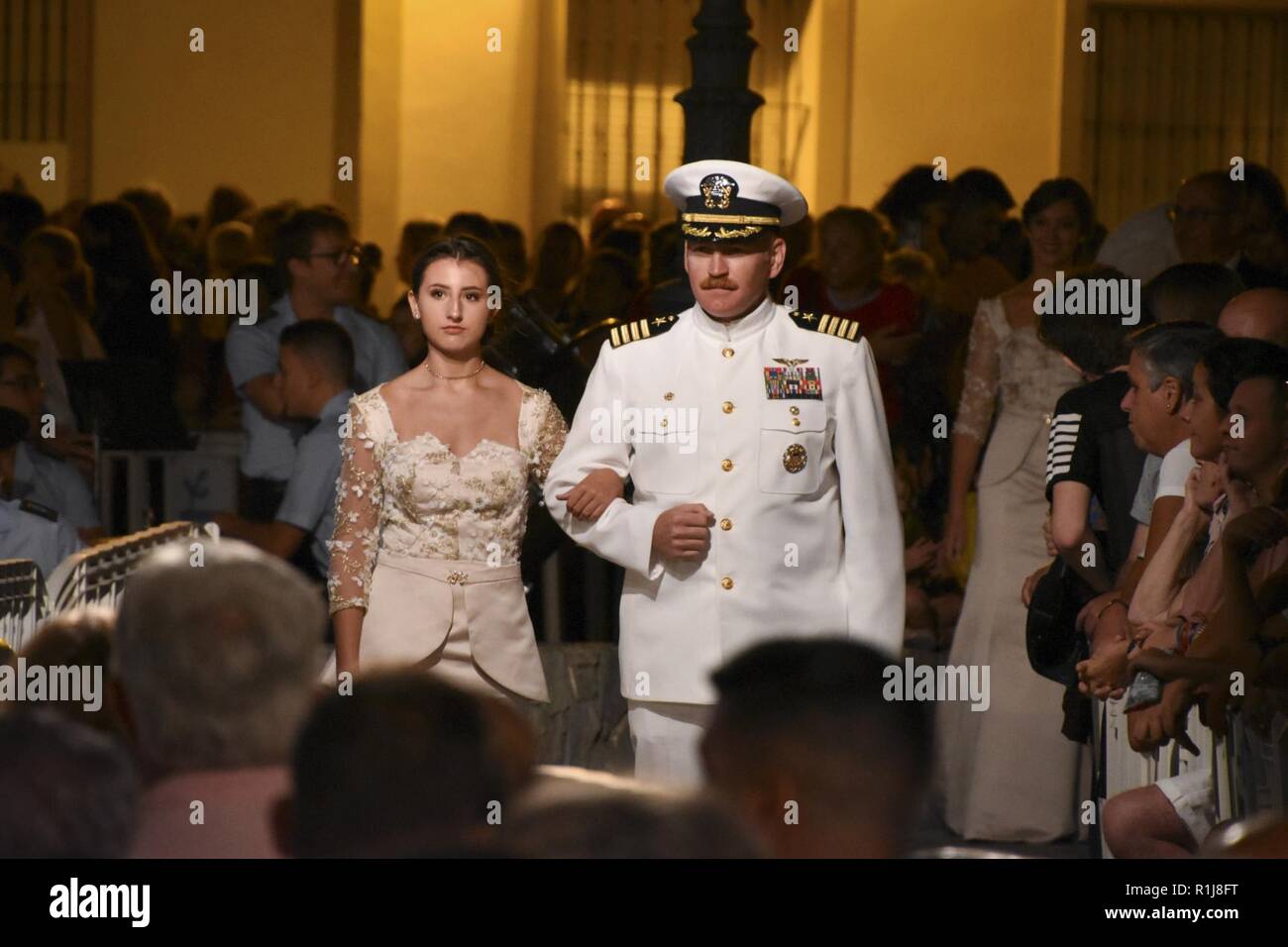 Capt. Mike MacNicholl, right, commanding officer of Naval Station Rota ...