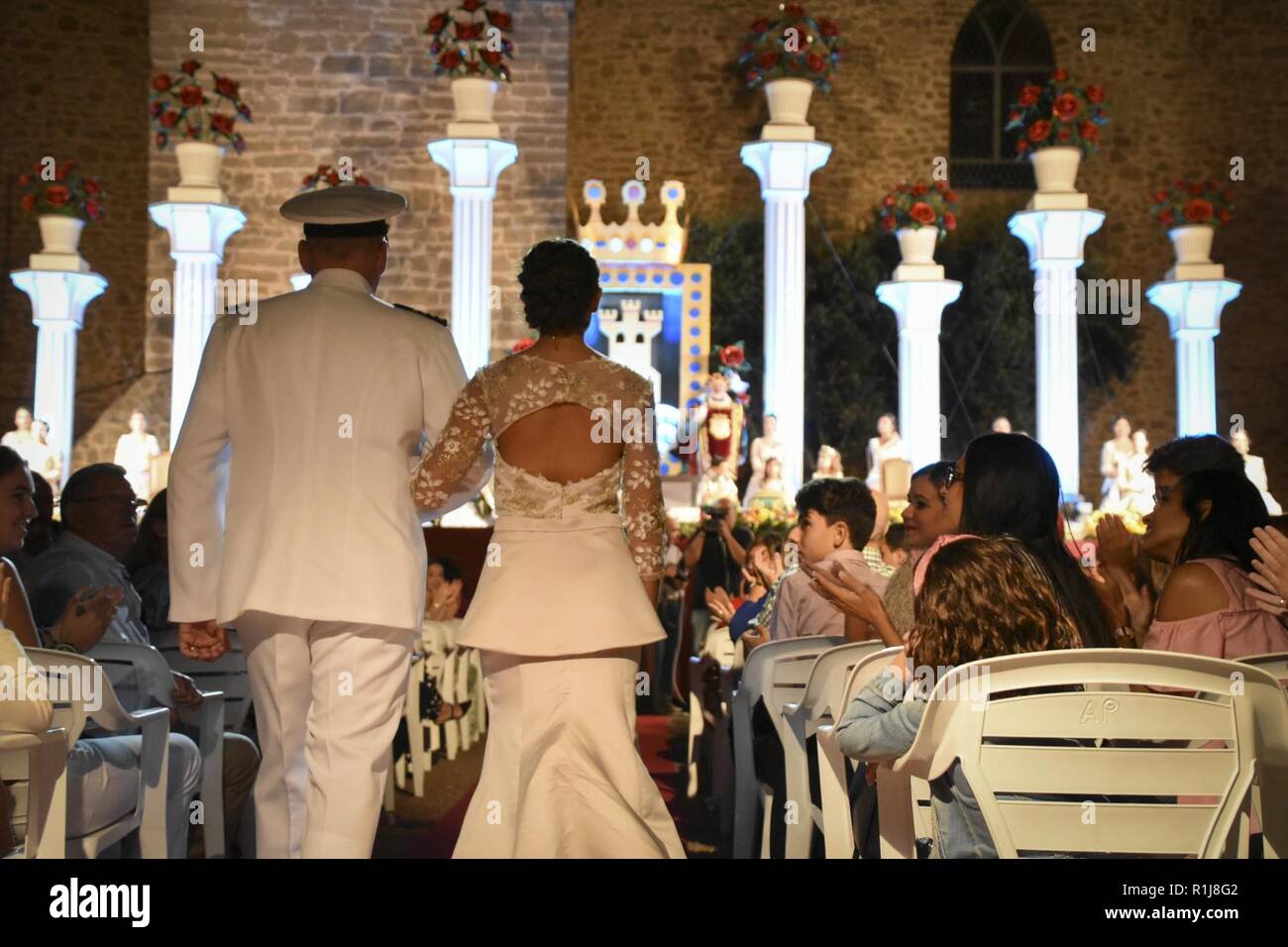 Capt. Mike MacNicholl, left, commanding officer of Naval Station Rota ...