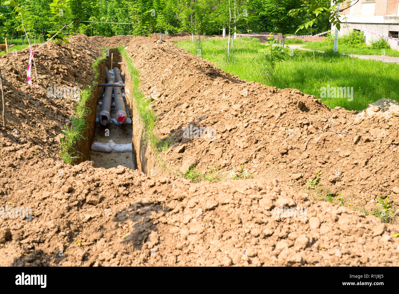 Old rusty street sign with arrows with clouds in background Stock Photo ...