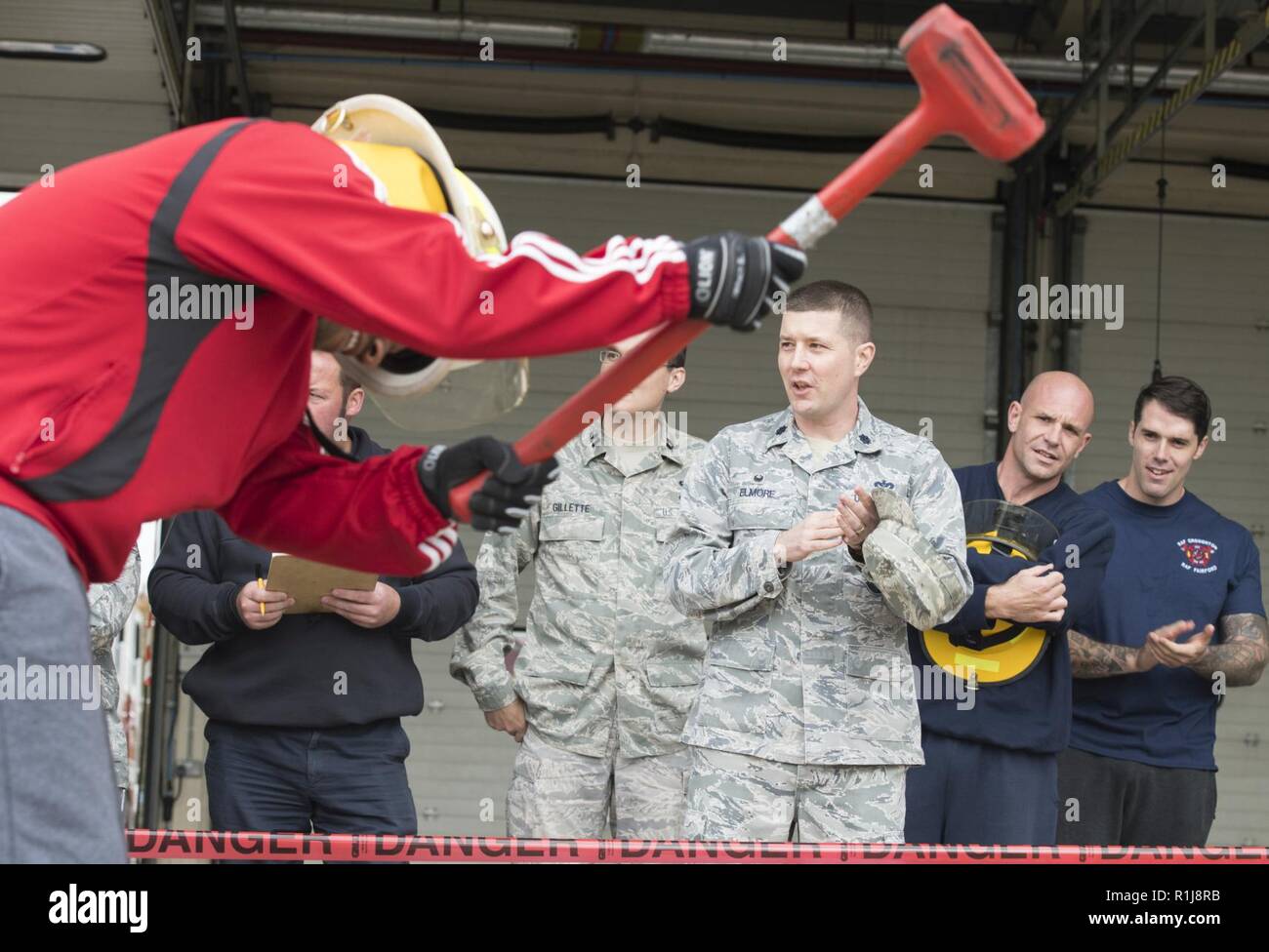 An audience cheers on Firefighter Challenge competitors at RAF ...