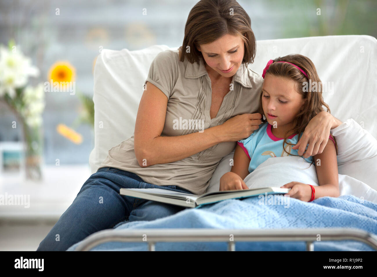 Child visit hospital reading hi-res stock photography and images - Alamy