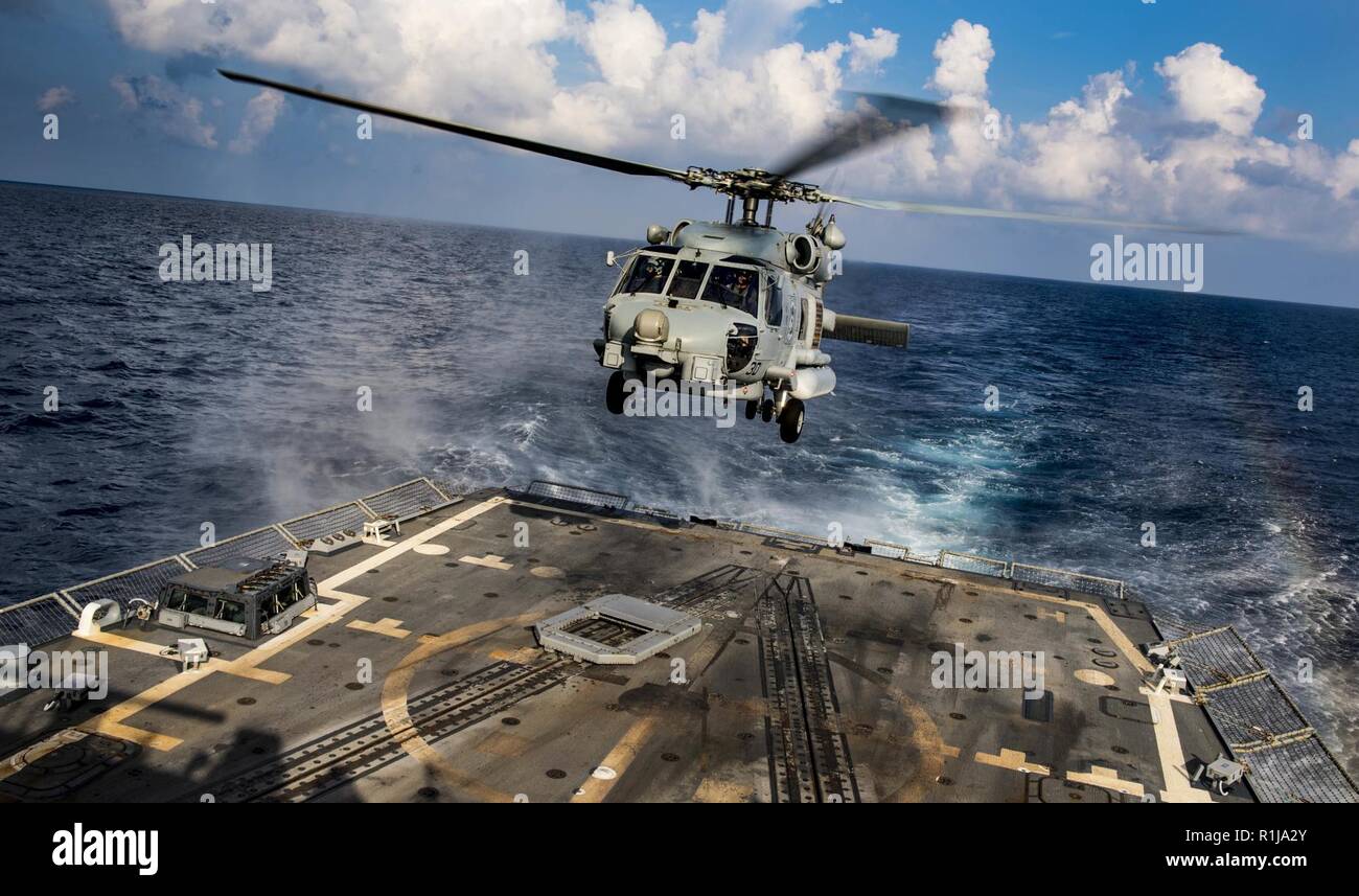 SOUTH CHINA SEA (Sept 25, 2018) An MH-60R Seahawk, assigned to the ...