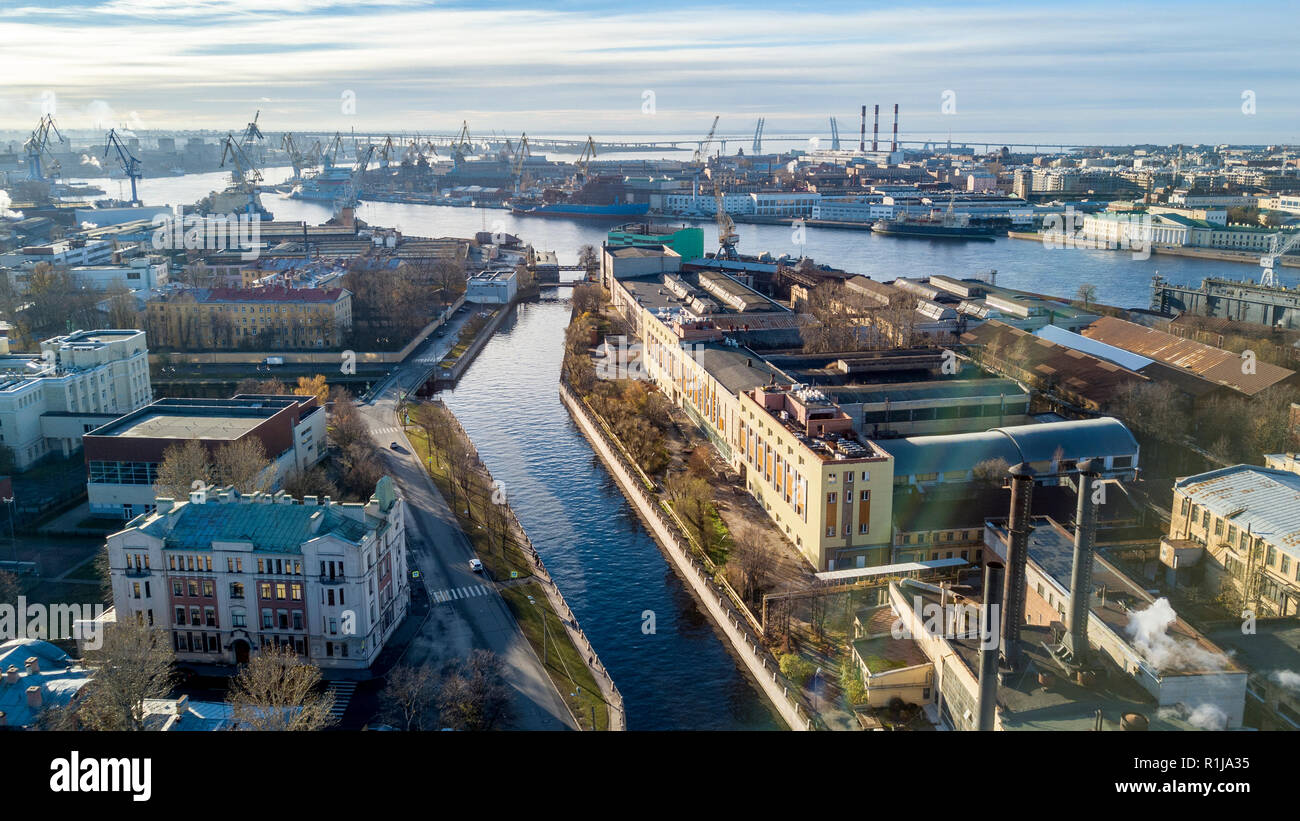 Aerial; drone view of river channel in historical city part with ...