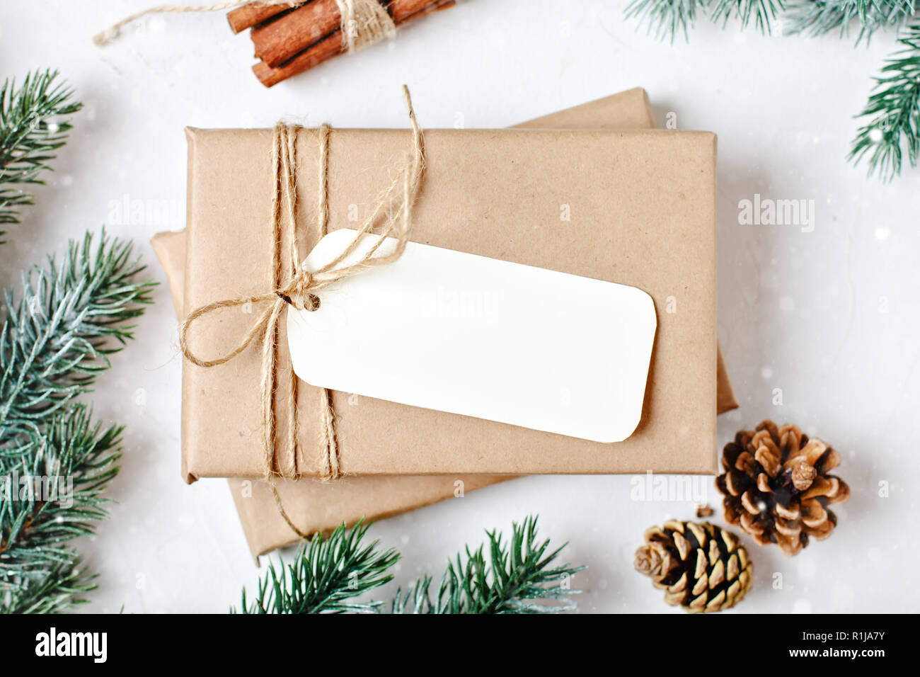 Merry Christmas and happy New year. Mockup with postcard and branches ...