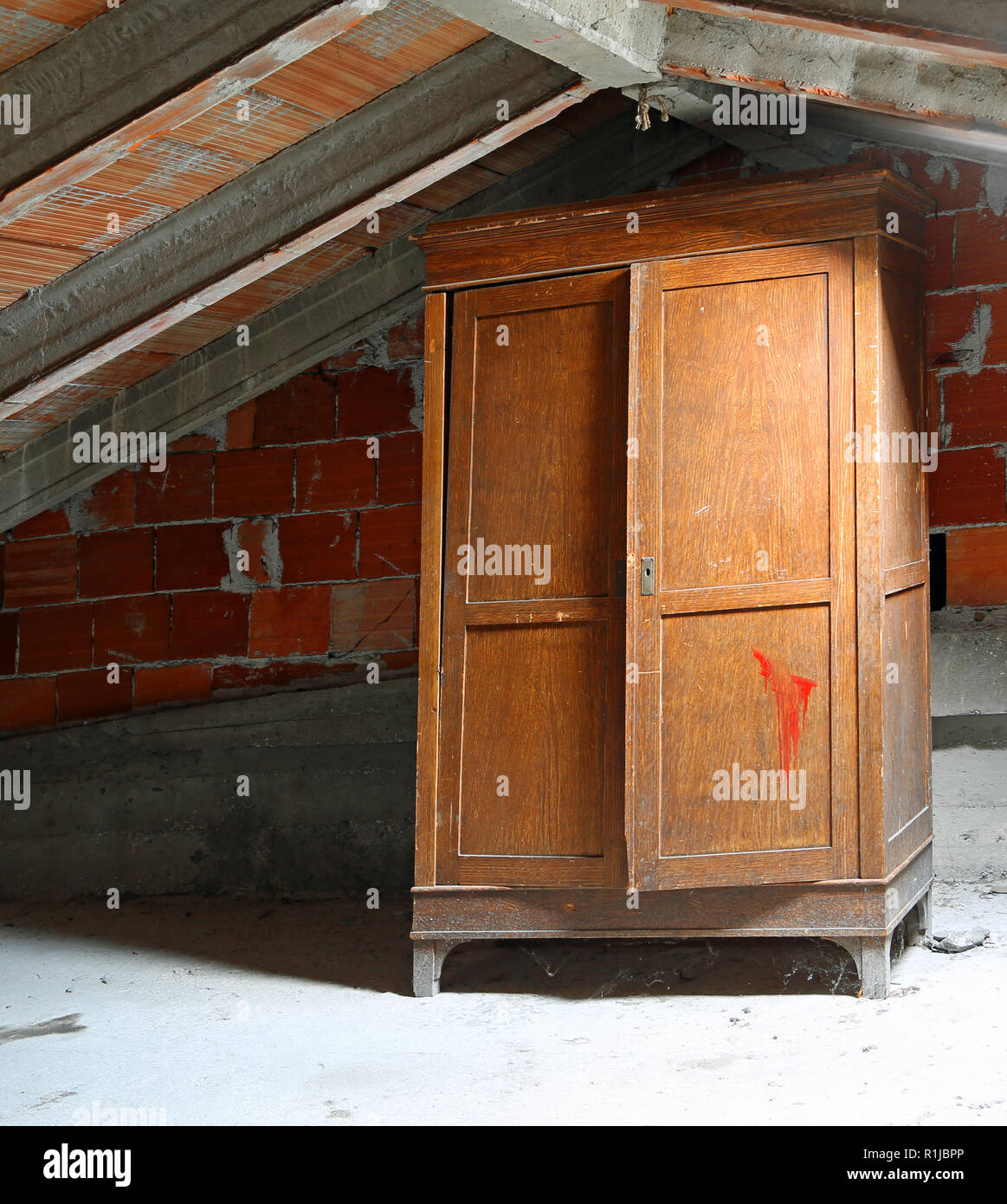 broken wooden wardrobe in the attic of an old house Stock Photo - Alamy