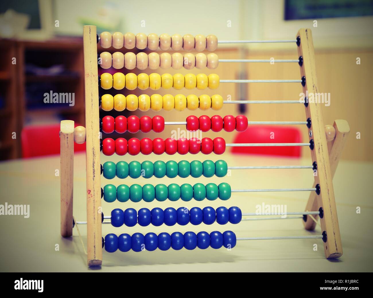 wooden abacus in the classroom with vintage effect Stock Photo - Alamy