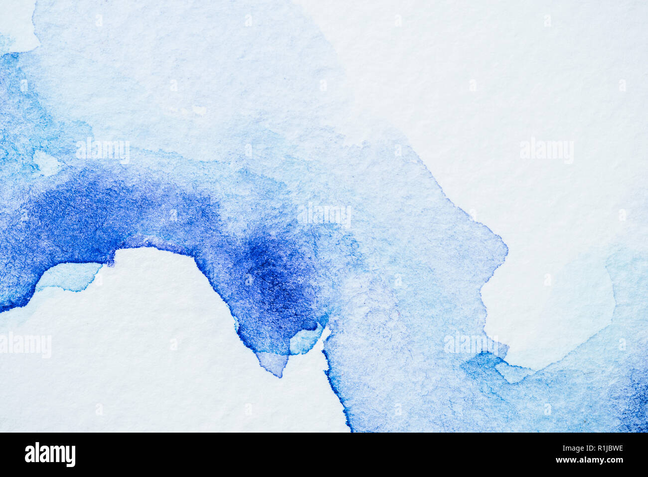 creative blue watercolor painting on white paper Stock Photo - Alamy