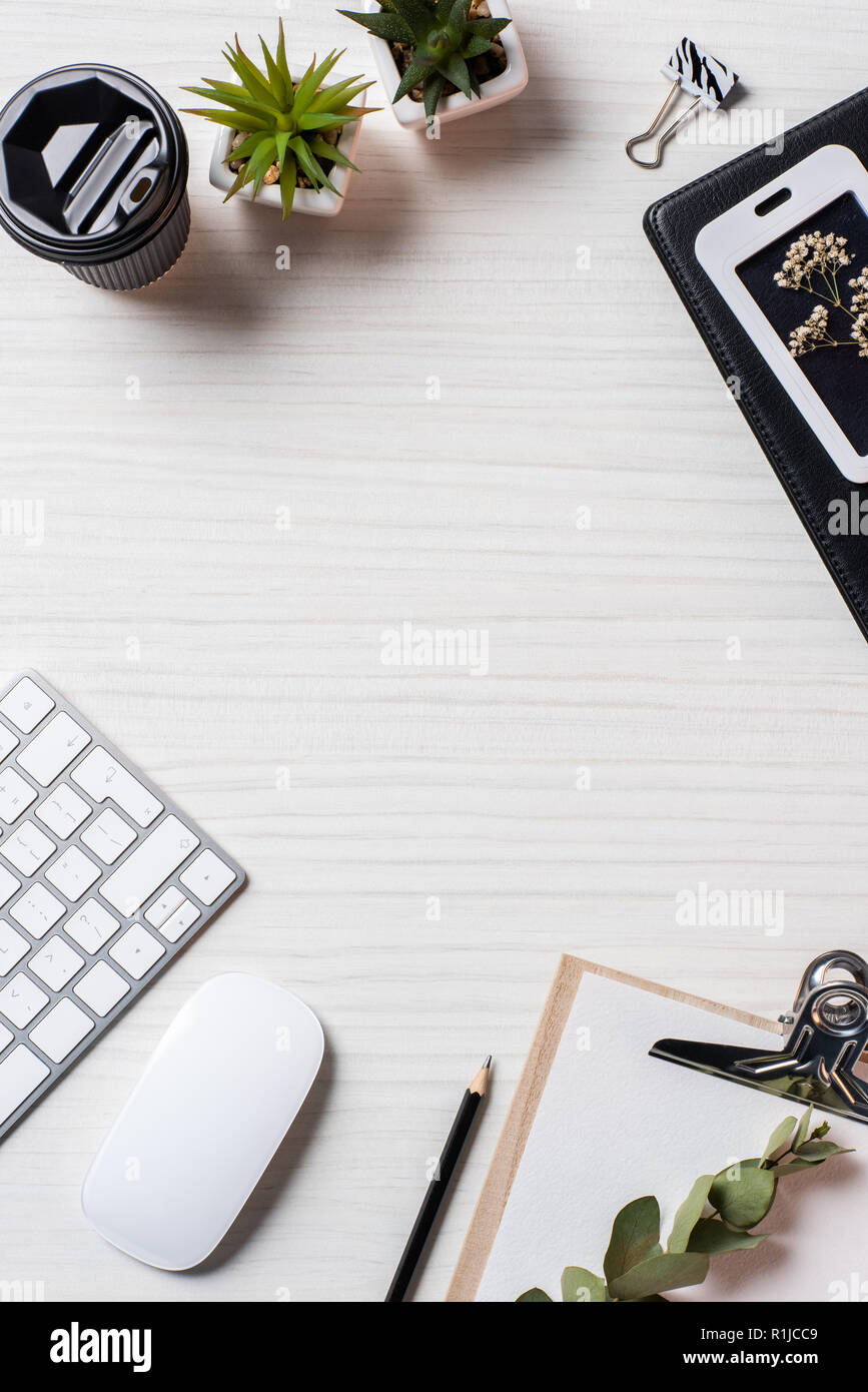 Flat lay elevated view of workplace with blank clipboard hi-res stock ...