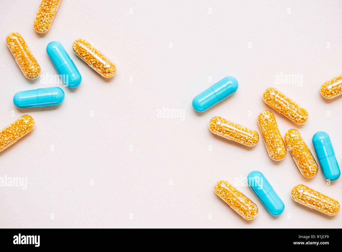 top view of plastic medical capsules on white Stock Photo - Alamy