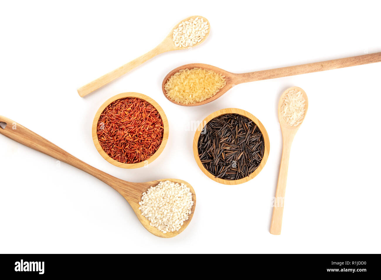 Many types of rice, shot from the top on a white background with a ...
