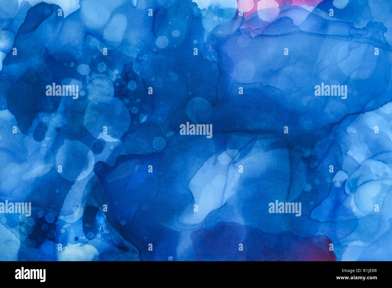 textured blue splashes of alcohol ink as abstract backdrop Stock Photo ...