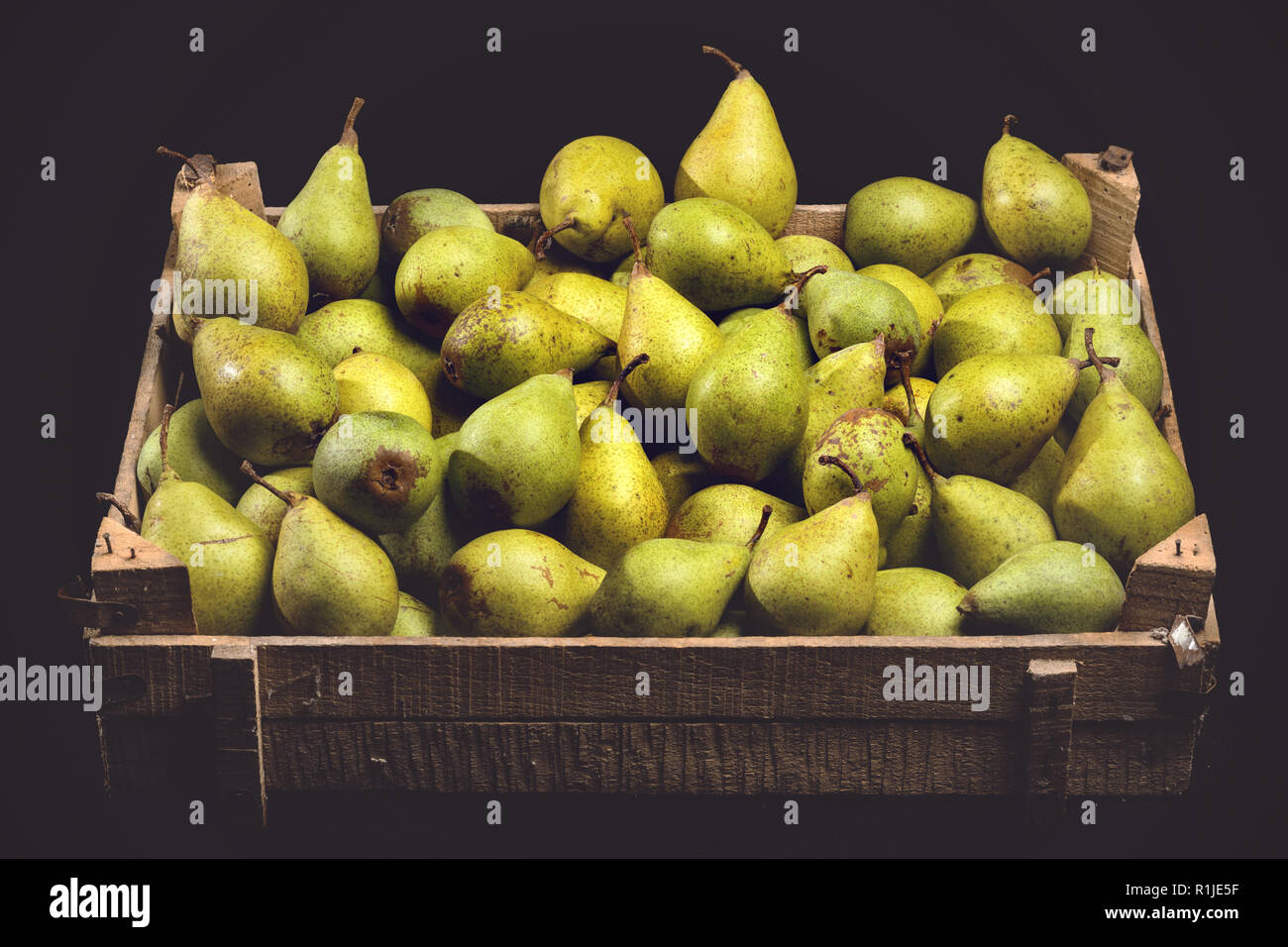 Organic pears in a wooden crate Stock Photo - Alamy