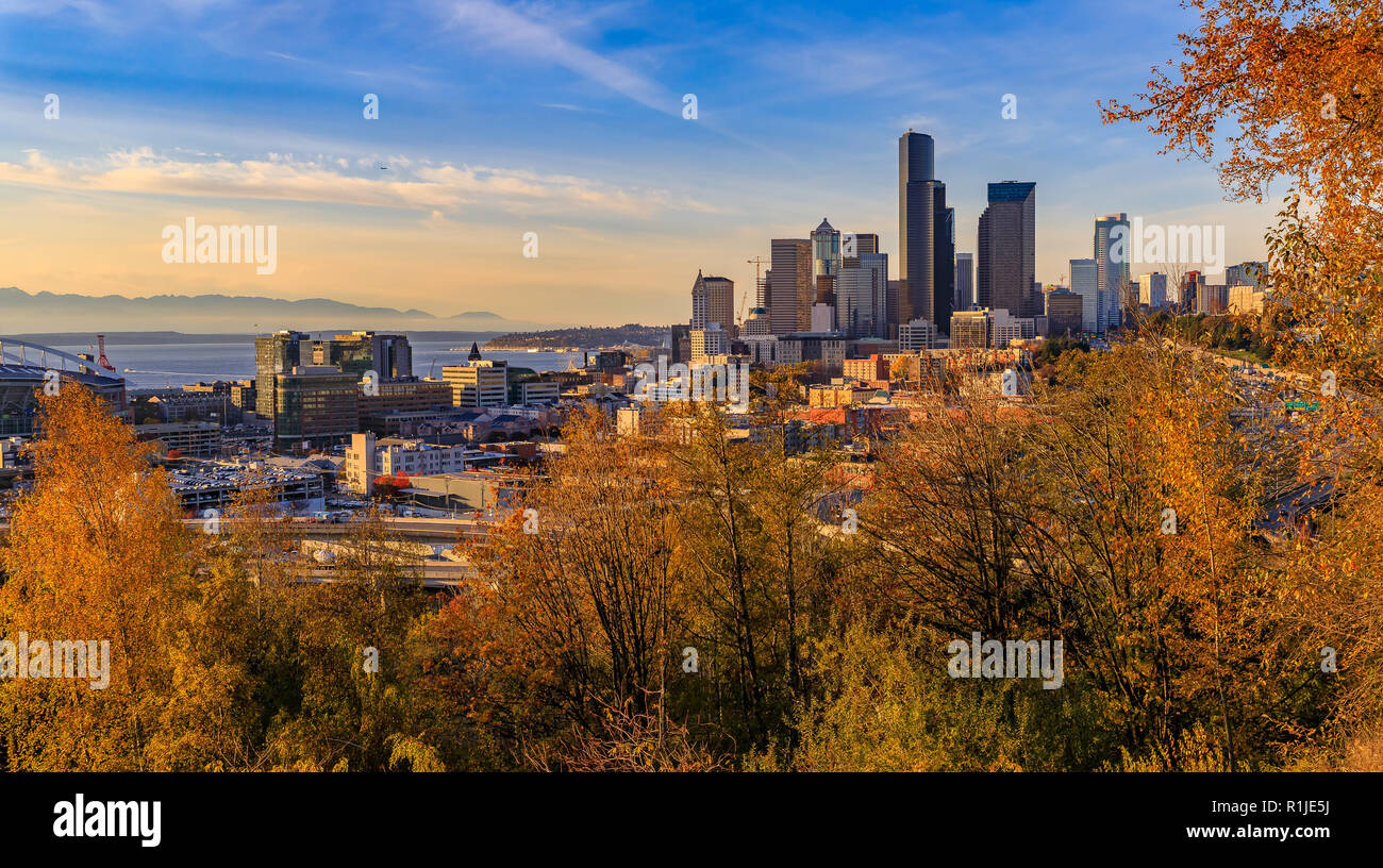 Panoramic view of Seattle downtown skyline at sunset in the fall with ...