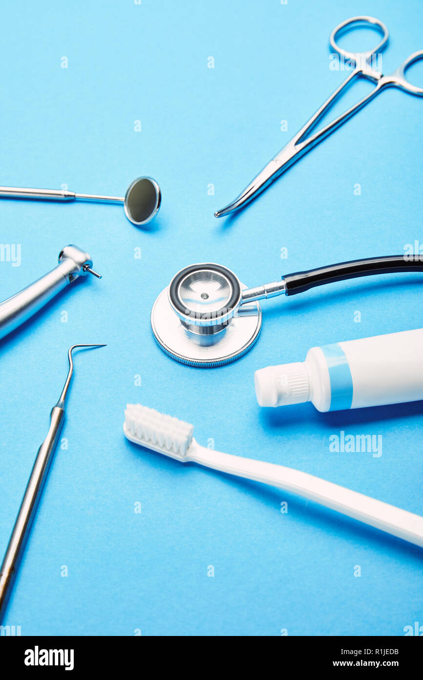 close up view of arrangement of sterile dental instruments, stethoscope ...