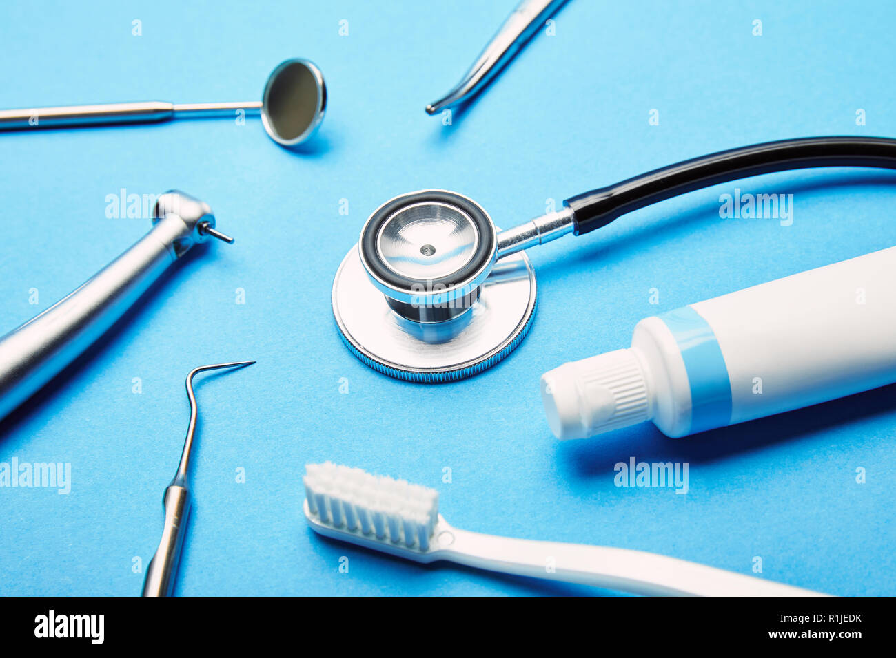 close up view of arrangement of sterile dental instruments, stethoscope ...