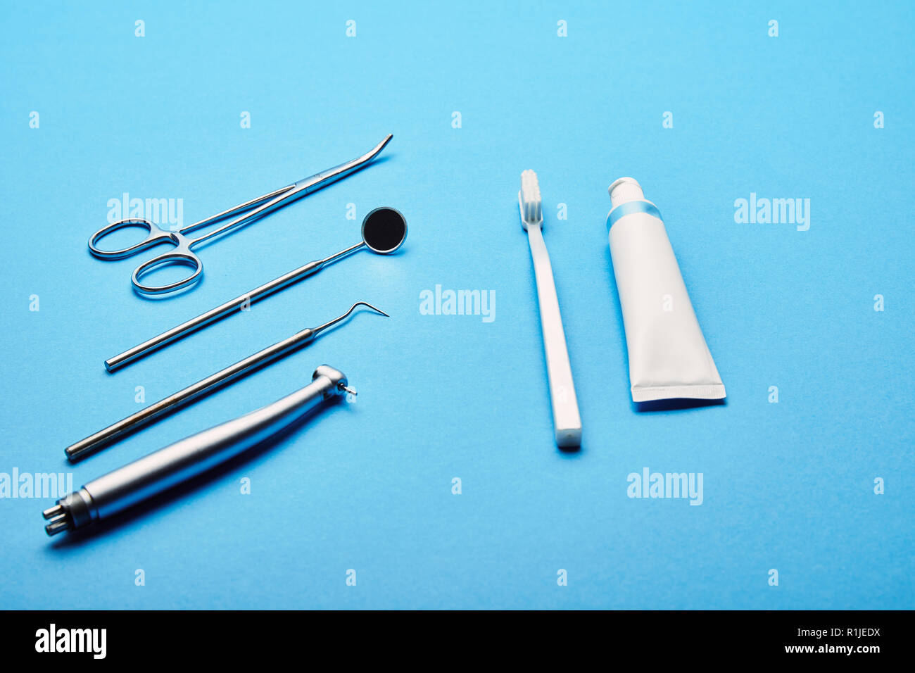 close up view of arrangement of sterile dental instruments, stethoscope ...