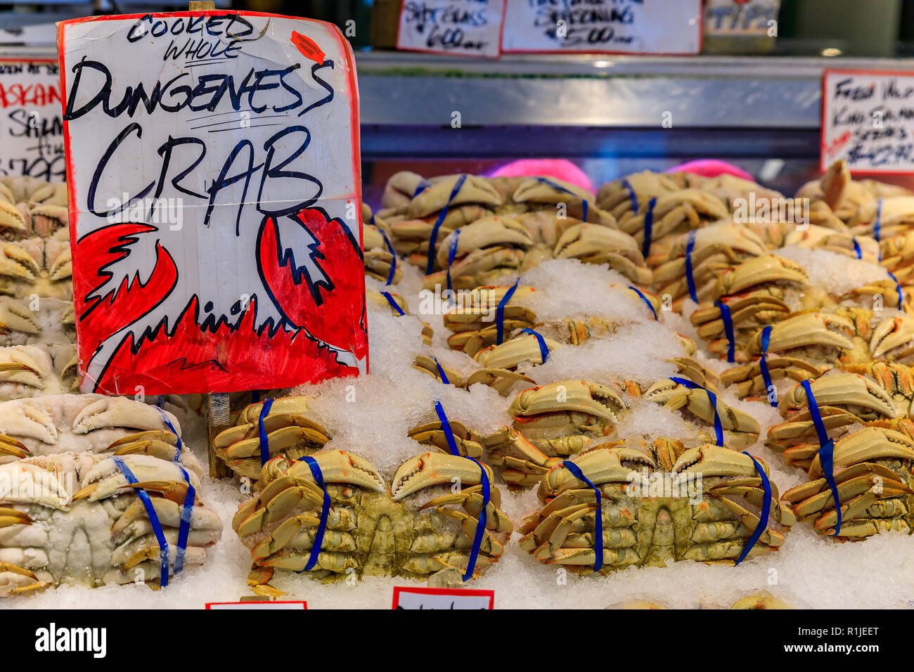 Fresh crab on ice for sale at Pike Place Market in Seattle, Washington ...