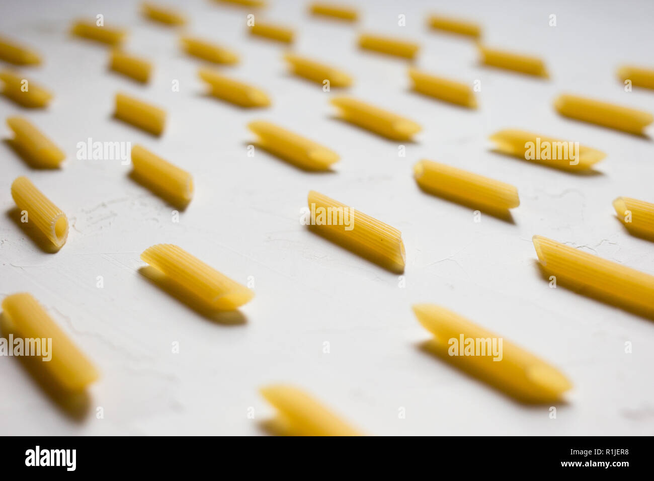 Italian Penne Rigate Macaroni Pasta raw food background or texture ...
