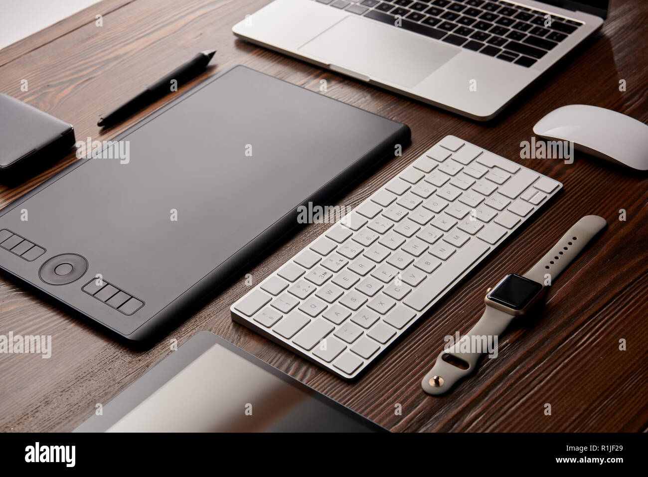 Desk computer various digital gadgets hi-res stock photography and ...