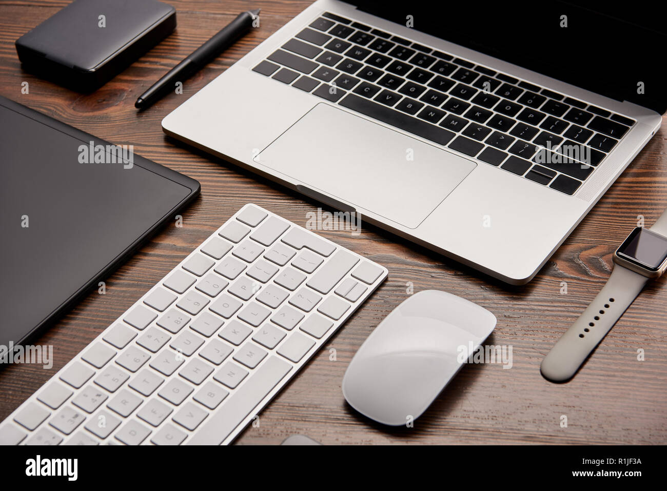 close-up shot of different wireless gadgets on graphics designer ...