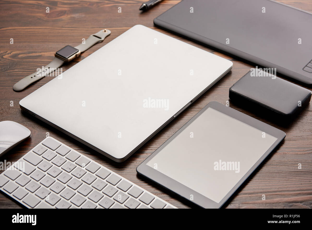 Desk computer various digital gadgets hi-res stock photography and ...
