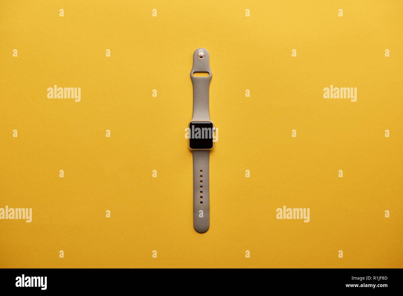 top view of smart watch with blank screen on yellow surface Stock Photo ...