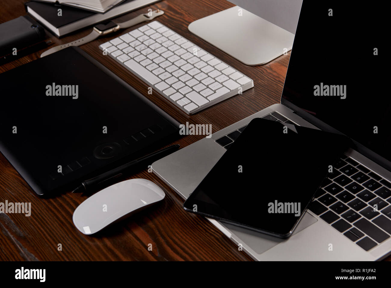Desk computer various digital gadgets hi-res stock photography and ...