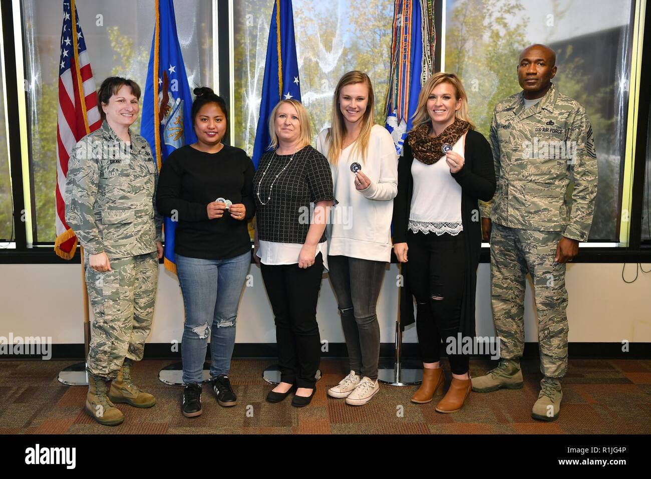 Col. Jennifer Grant, 50th Space Wing commander, left, and Chief Master ...