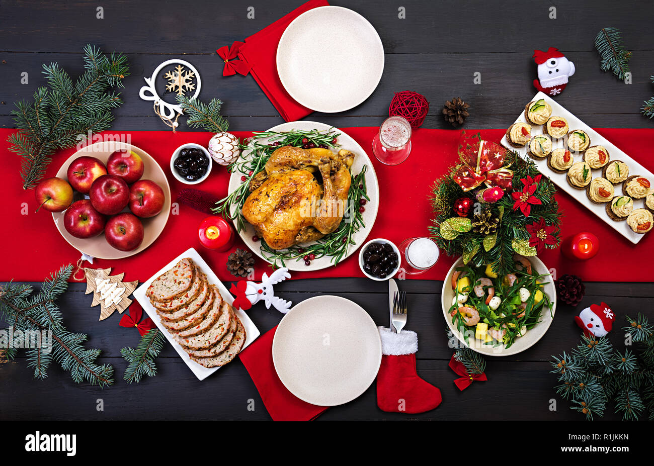 Baked turkey. Christmas dinner. The Christmas table is served with a ...