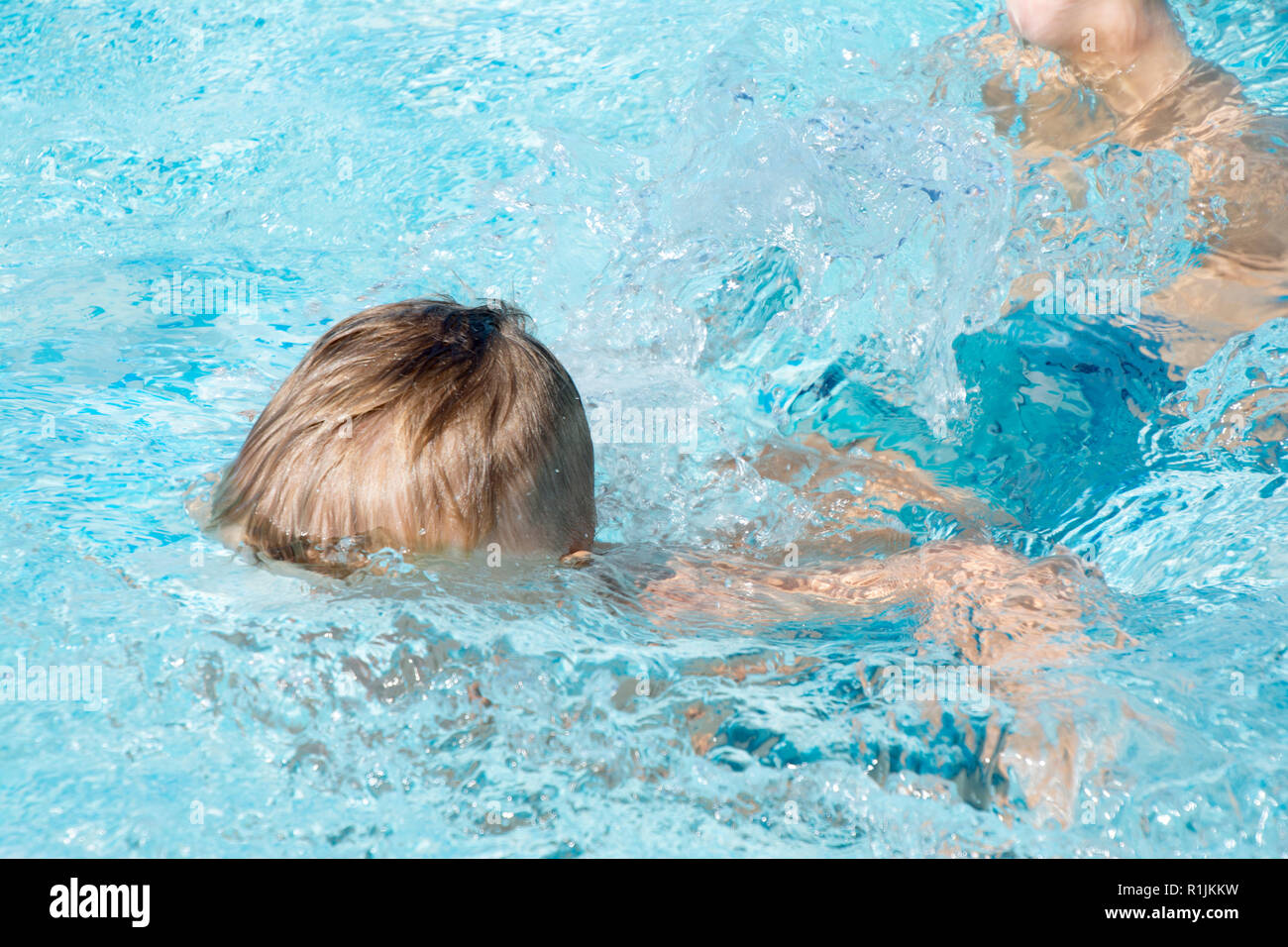 Boy holding breath underwater hi-res stock photography and images - Alamy