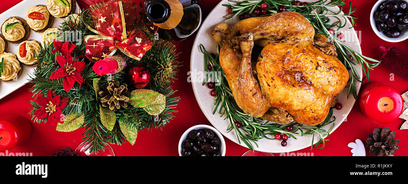 Baked turkey. Christmas dinner. The Christmas table is served with a ...