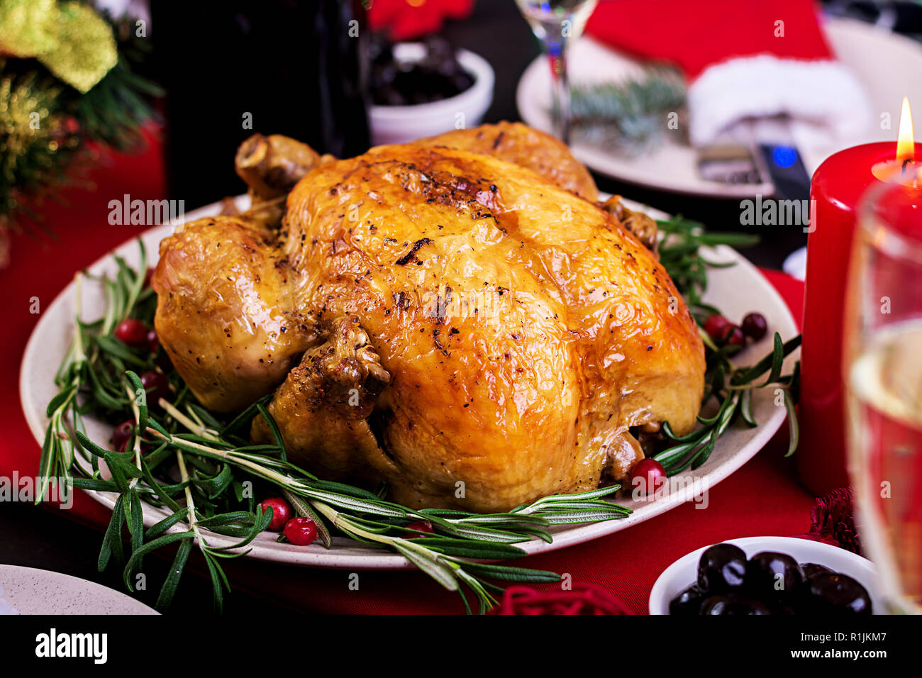 Baked turkey. Christmas dinner. The Christmas table is served with a ...