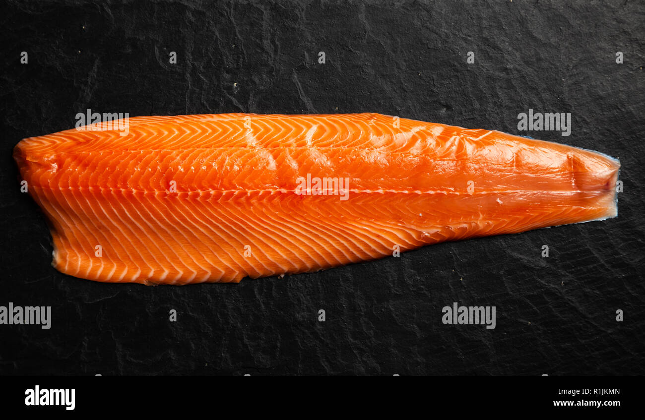 Fresh raw salmon fish fillet Stock Photo - Alamy