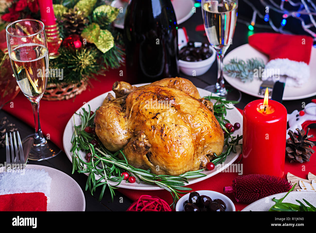 Baked turkey. Christmas dinner. The Christmas table is served with a ...