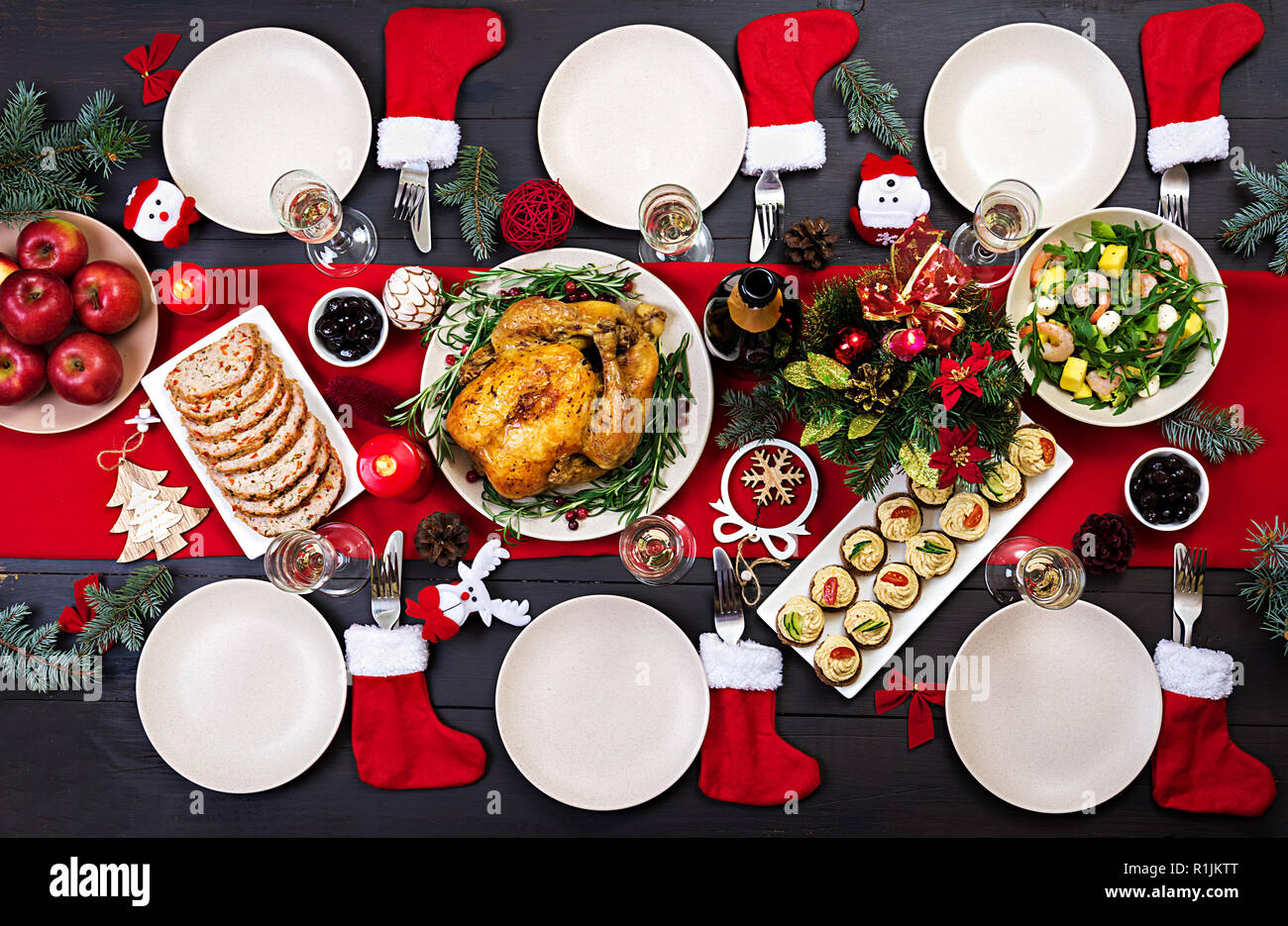 Baked turkey. Christmas dinner. The Christmas table is served with a ...