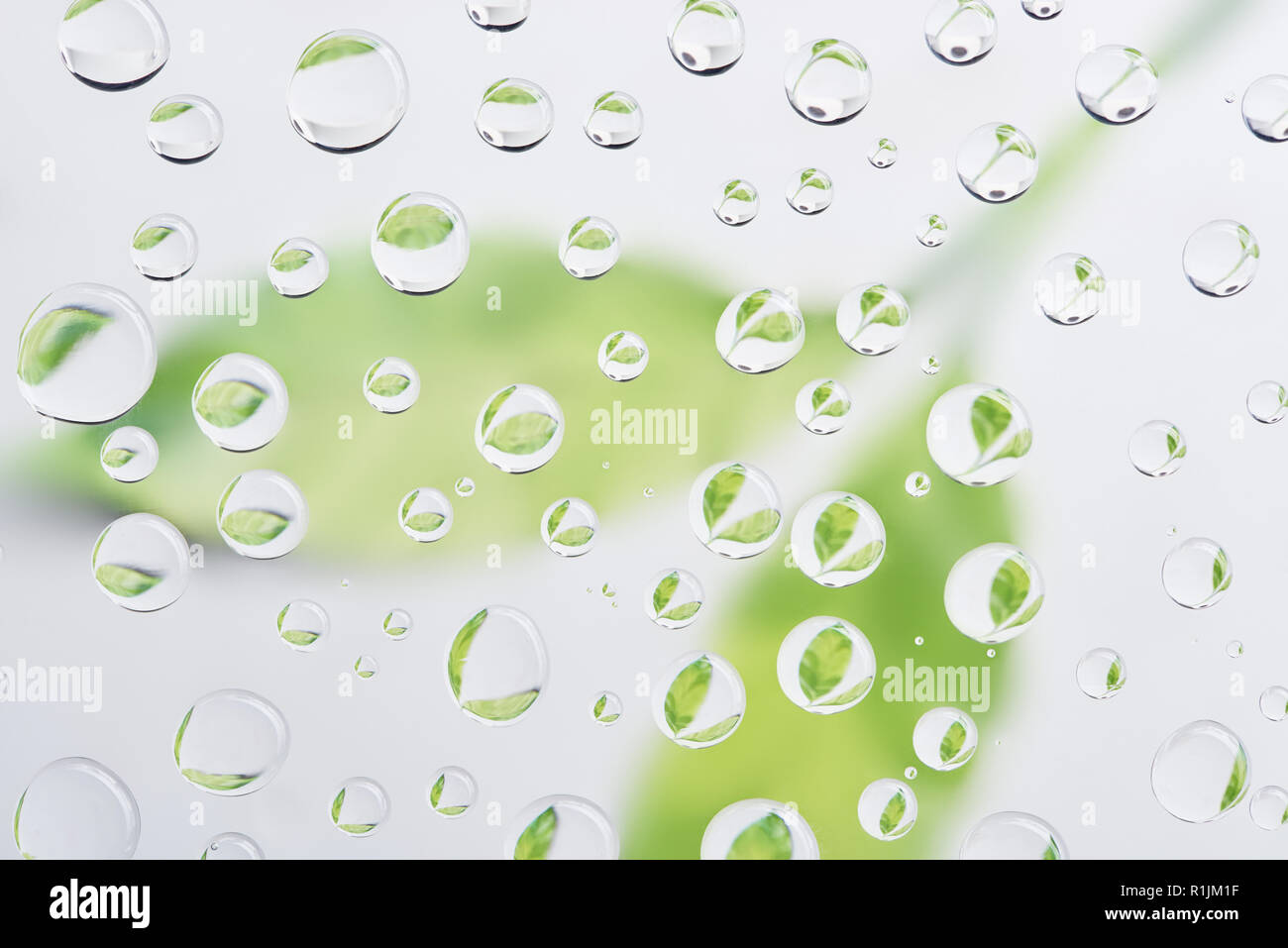 beautiful clean water drops on blurred abstract background Stock Photo ...