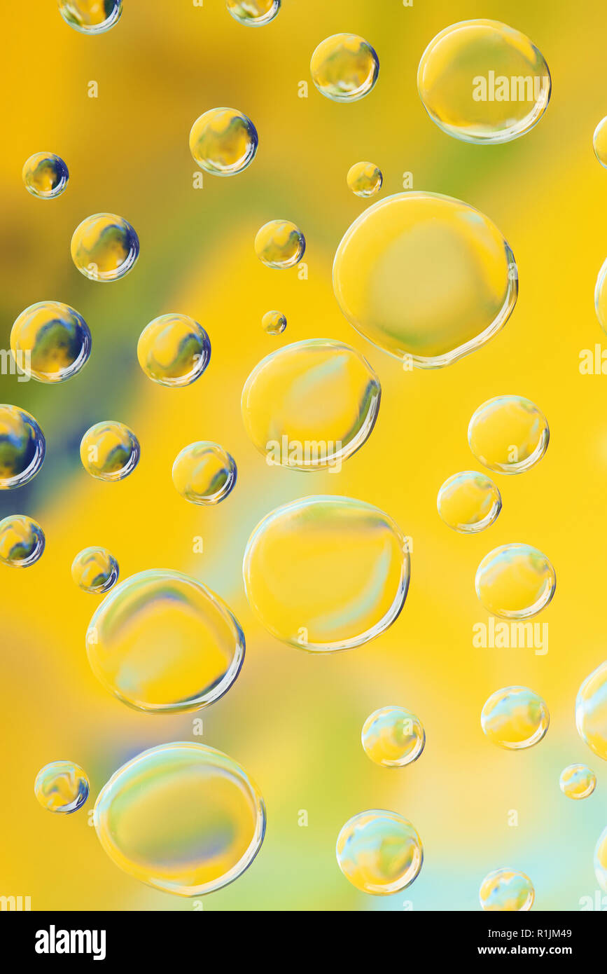 beautiful calm clean water drops on yellow abstract background Stock ...