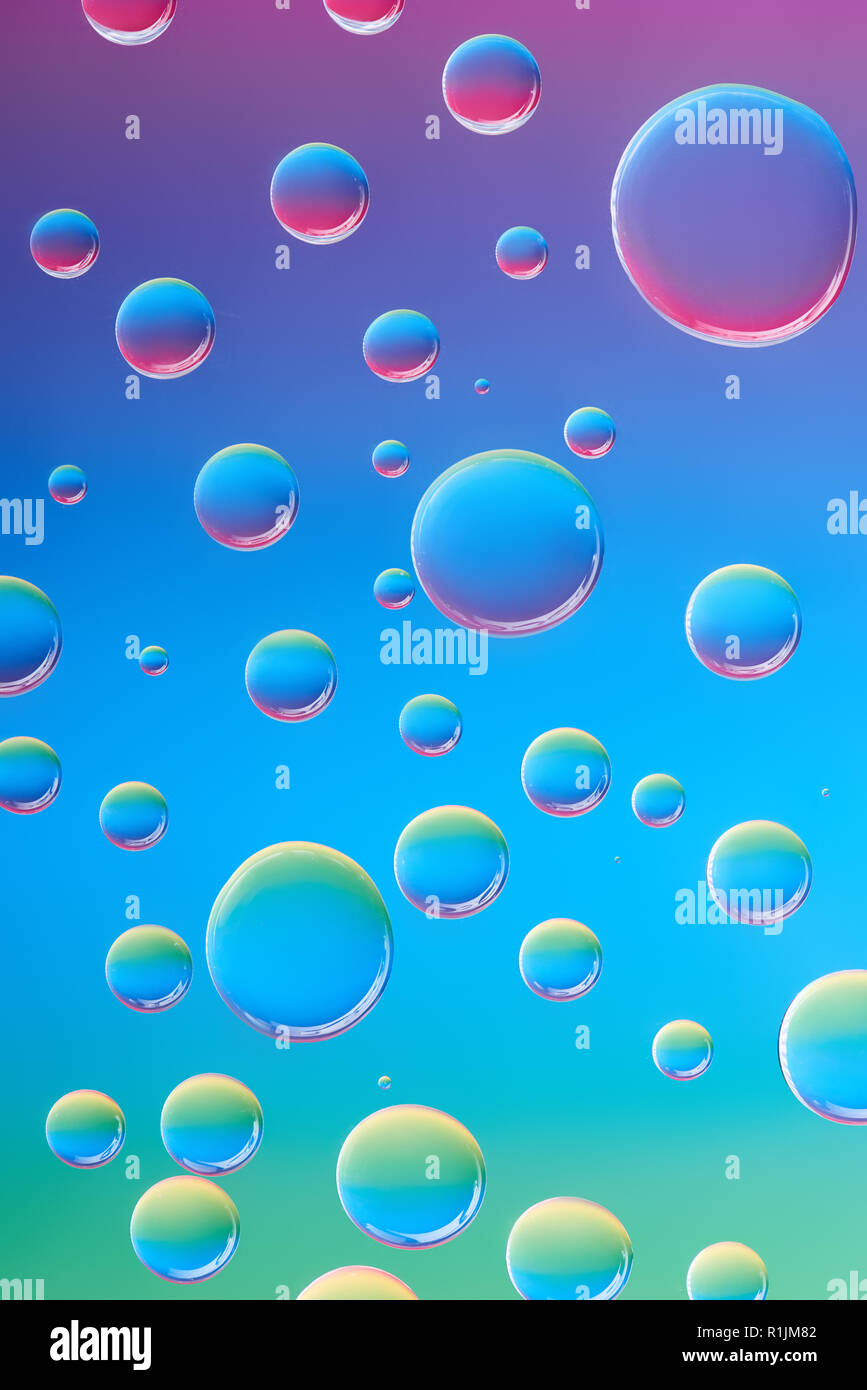 close-up view of beautiful calm transparent water drops on bright ...