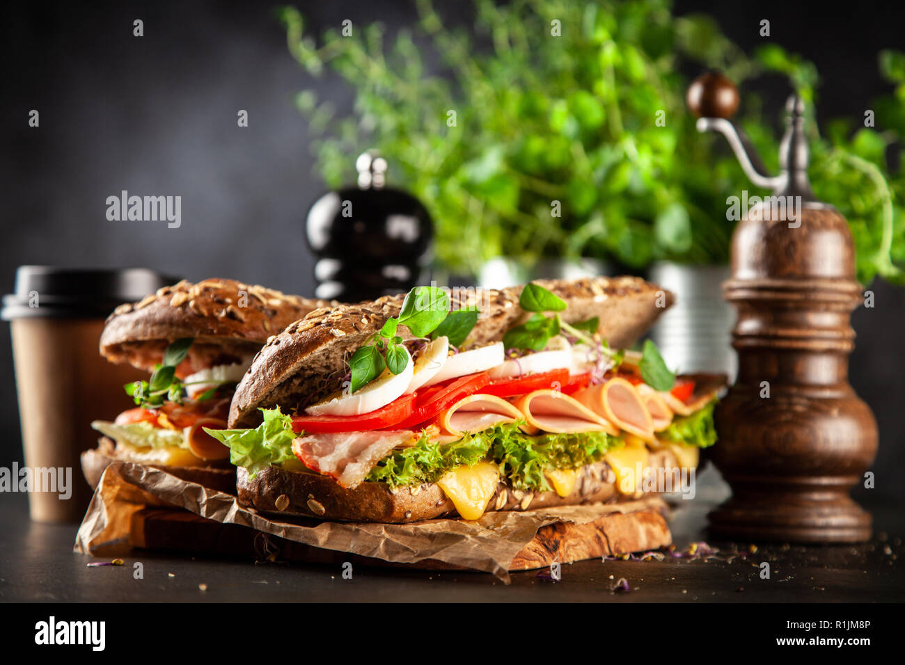 Classic BLT sandwiches on dark background Stock Photo - Alamy