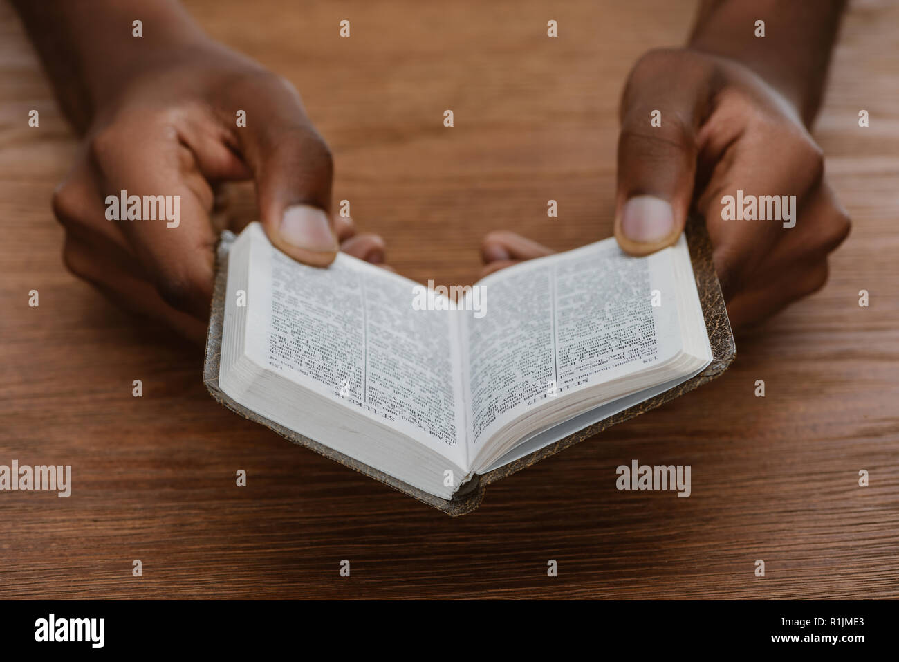 Man reading holy bible hi-res stock photography and images - Alamy
