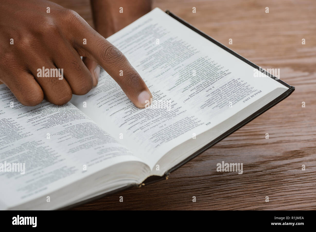Man reading holy bible hi-res stock photography and images - Alamy