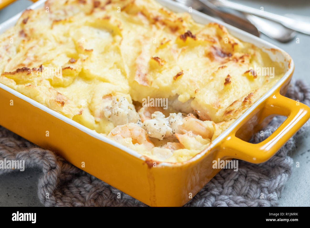 Fish pie with shrimp topped with mashed potato Stock Photo - Alamy