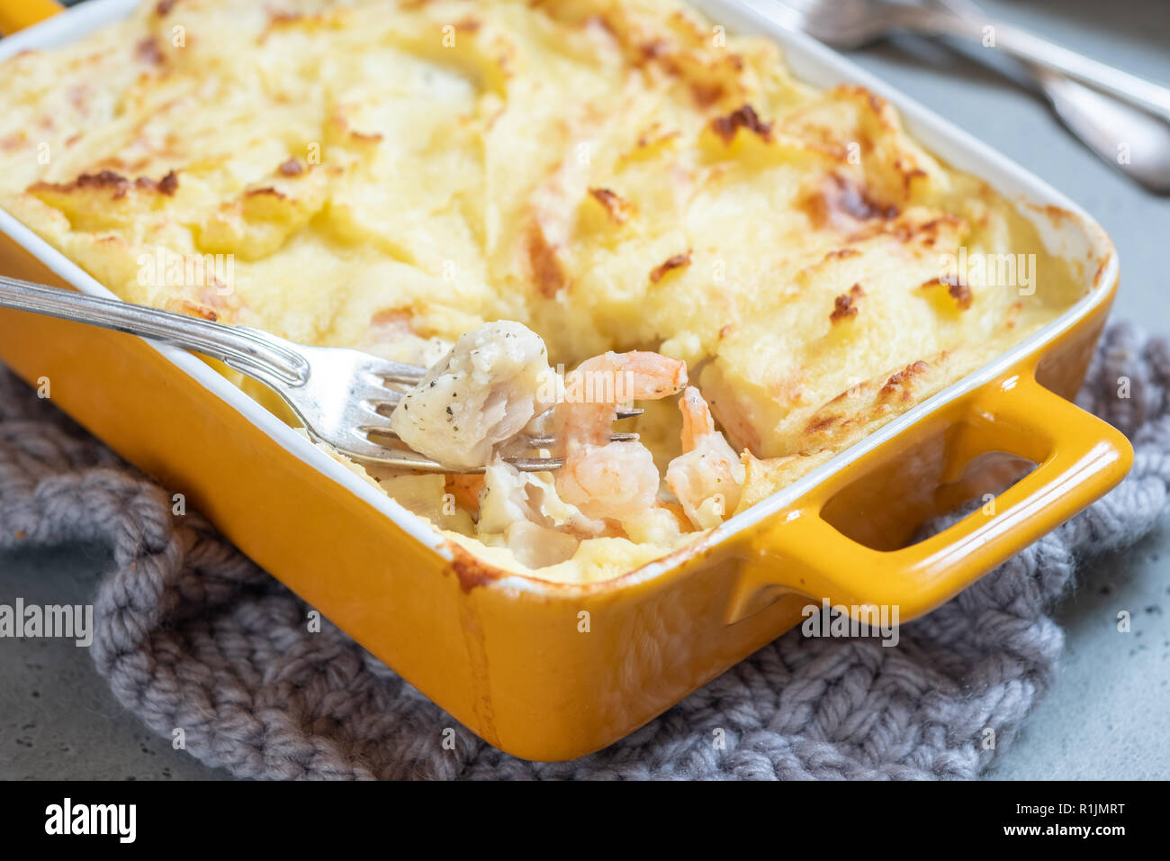 Fish pie with shrimp topped with mashed potato Stock Photo - Alamy