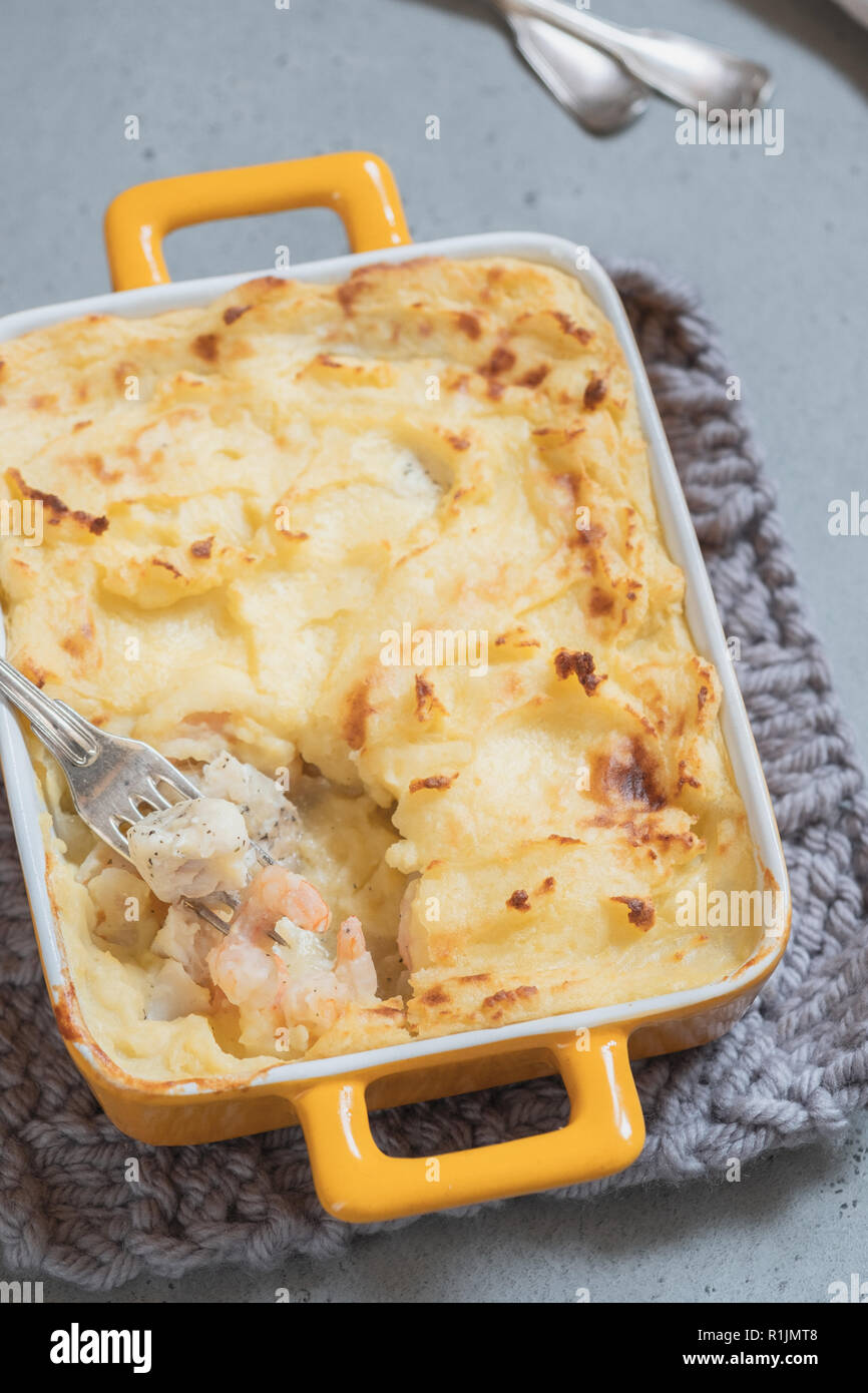 Fish pie with shrimp topped with mashed potato Stock Photo - Alamy