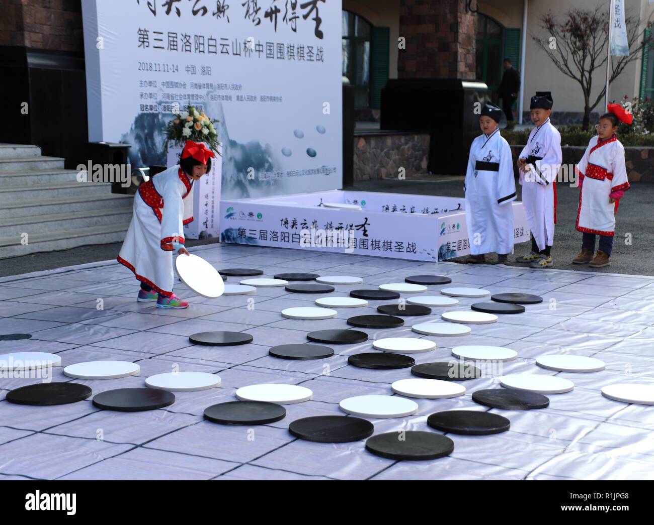 China. 13th Nov, 2018. Luoyang, CHINA-People play a special go chess ...