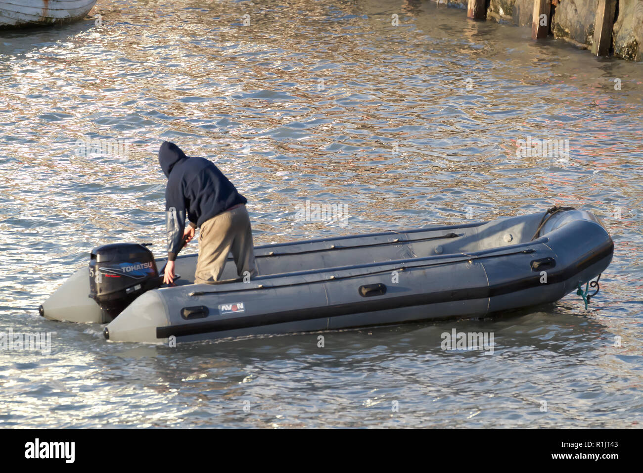 Dolphin boat engine hi-res stock photography and images - Alamy