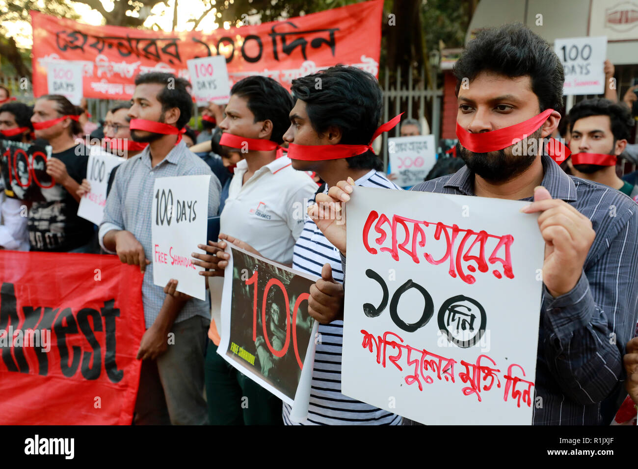 Dhaka, Bangladesh - November 13, 2018: Photographers gathered at Shahbag in Dhaka, holding in ...