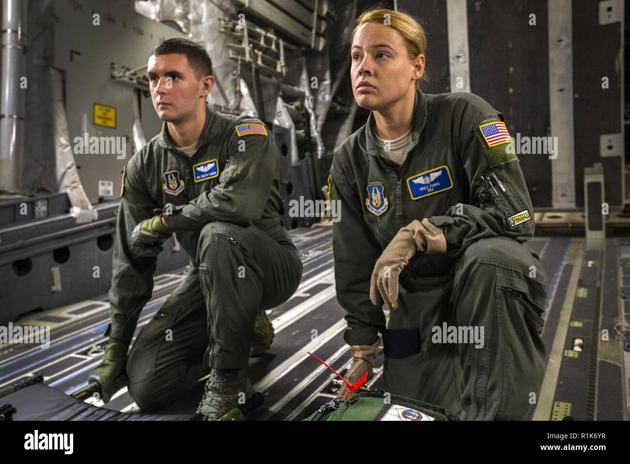 U.S. Air Force Senior Airman Timothy D. Congo, left, an aeromedical ...