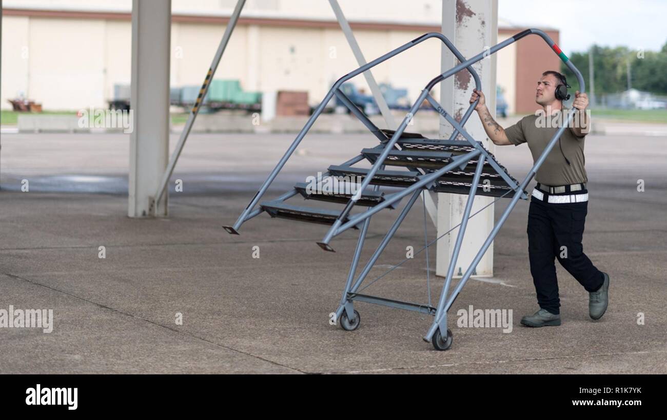 A Maintainer from Shaw Air Force Base, S.C., carries a ladder on the ...