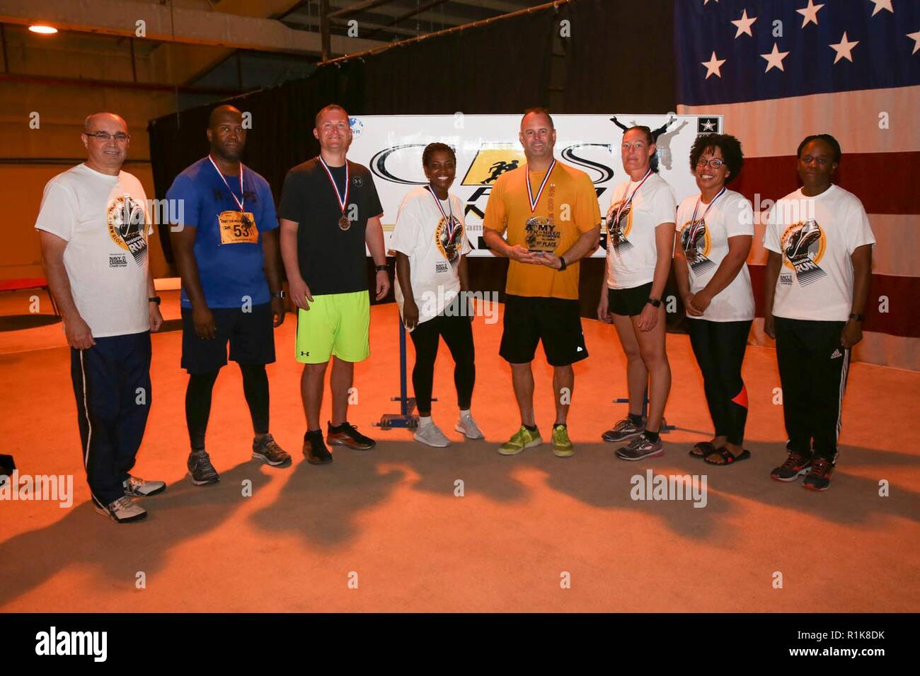 U.S. Army Soldiers from Area Support Group-Qatar accept an award for ...
